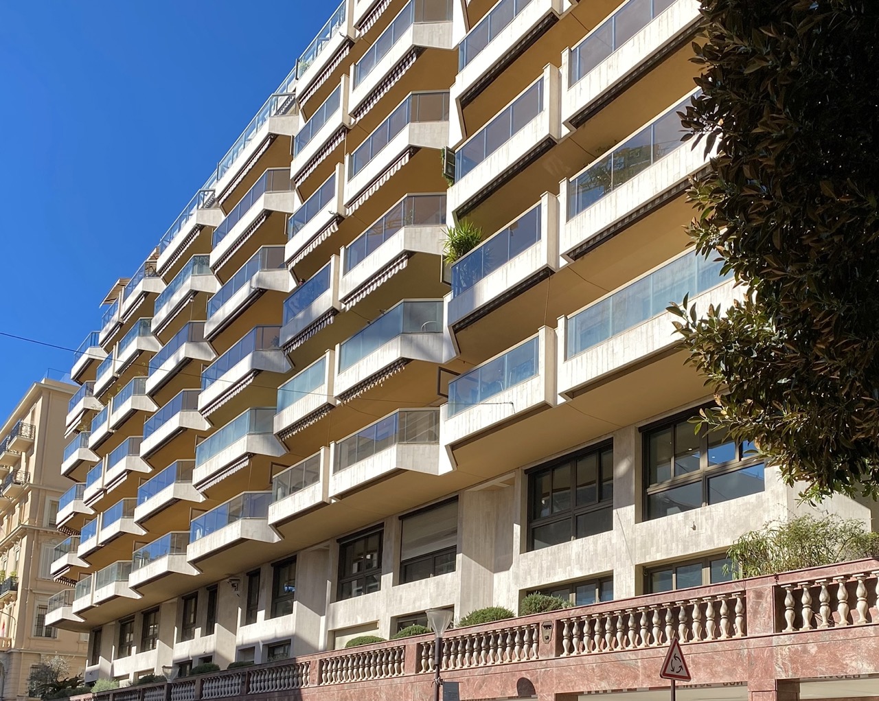 Regina | Monaco Buildings - Caroline Olds Real Estate